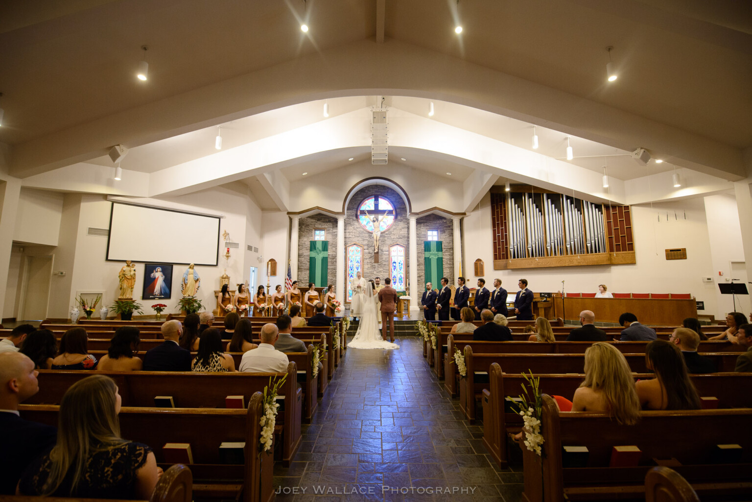 A heavenly catholic wedding ceremony at the Holy Trinity Catholic ...